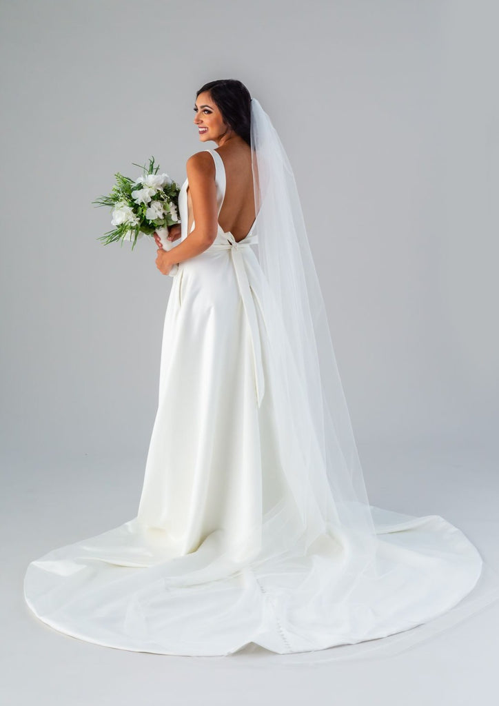 The Back Put On Wedding Dress Photo Shoot